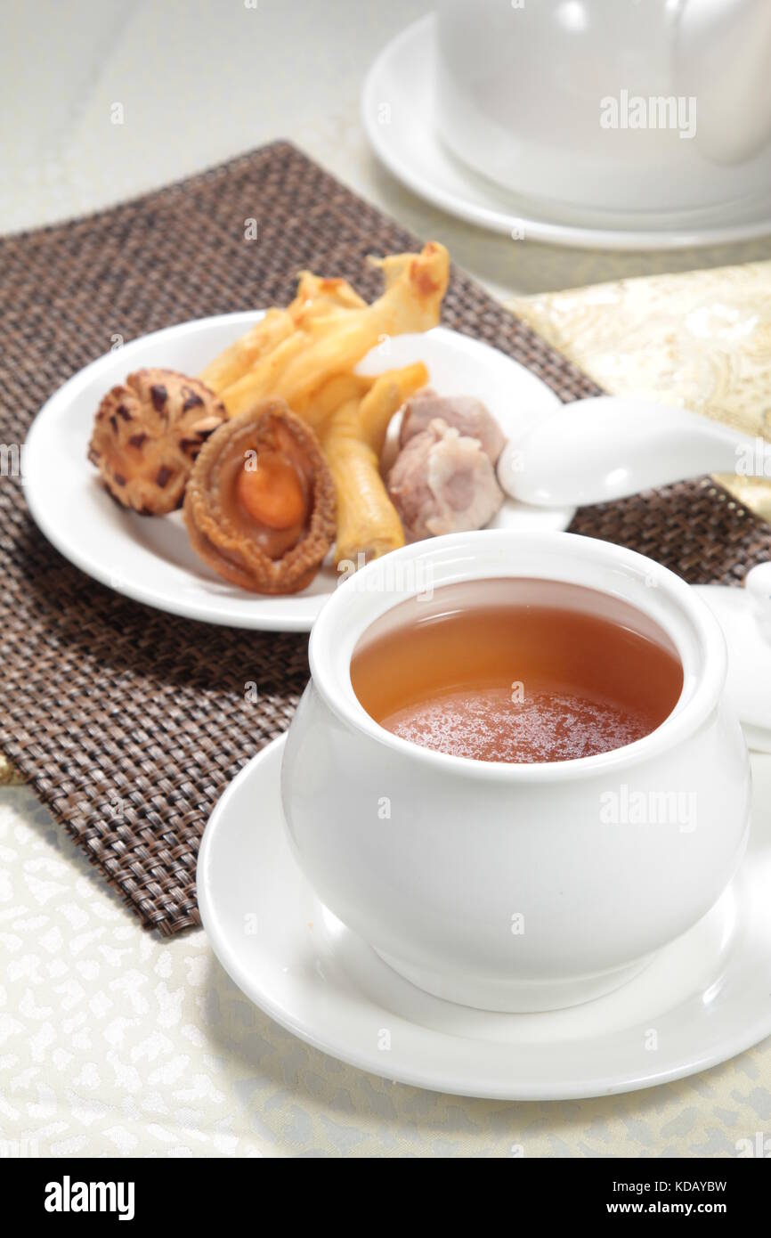 chinese chicken or seafood broth Stock Photo - Alamy