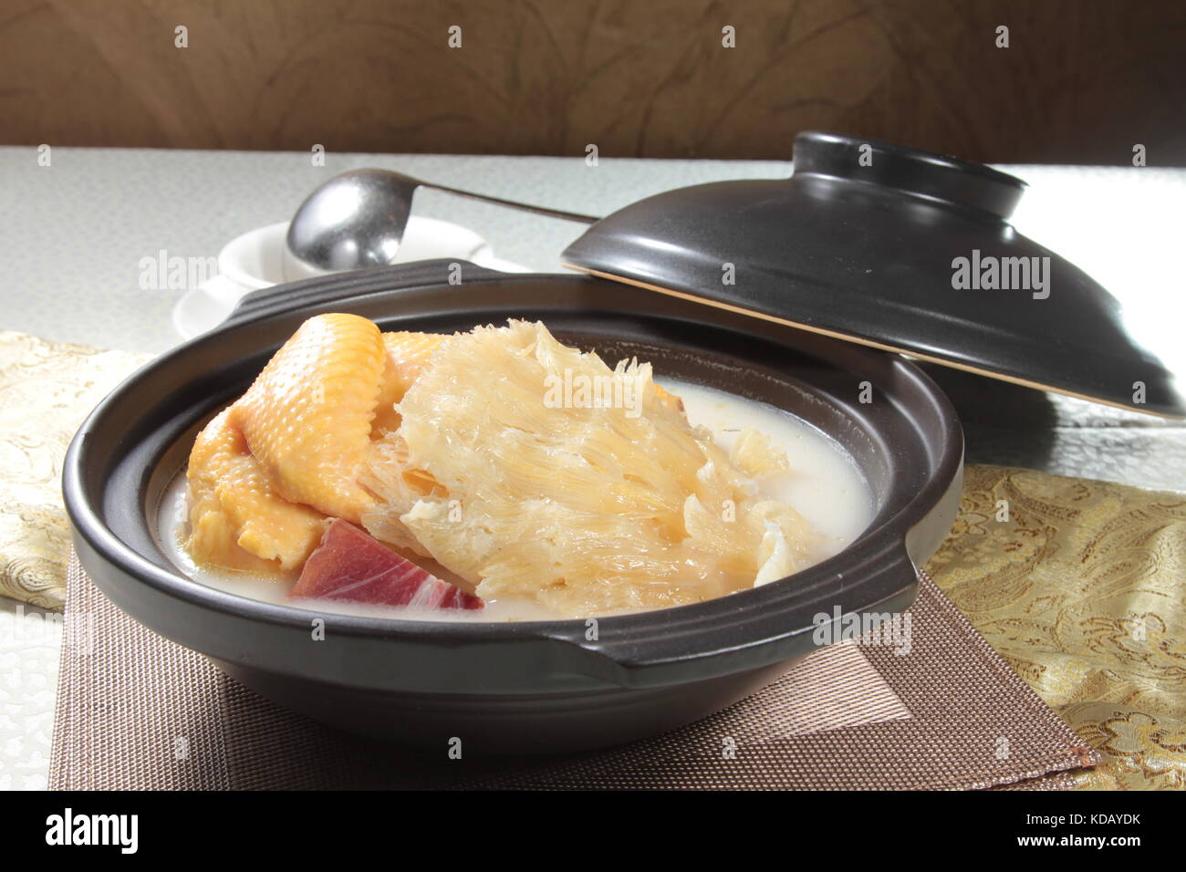 chinese chicken or seafood broth Stock Photo - Alamy
