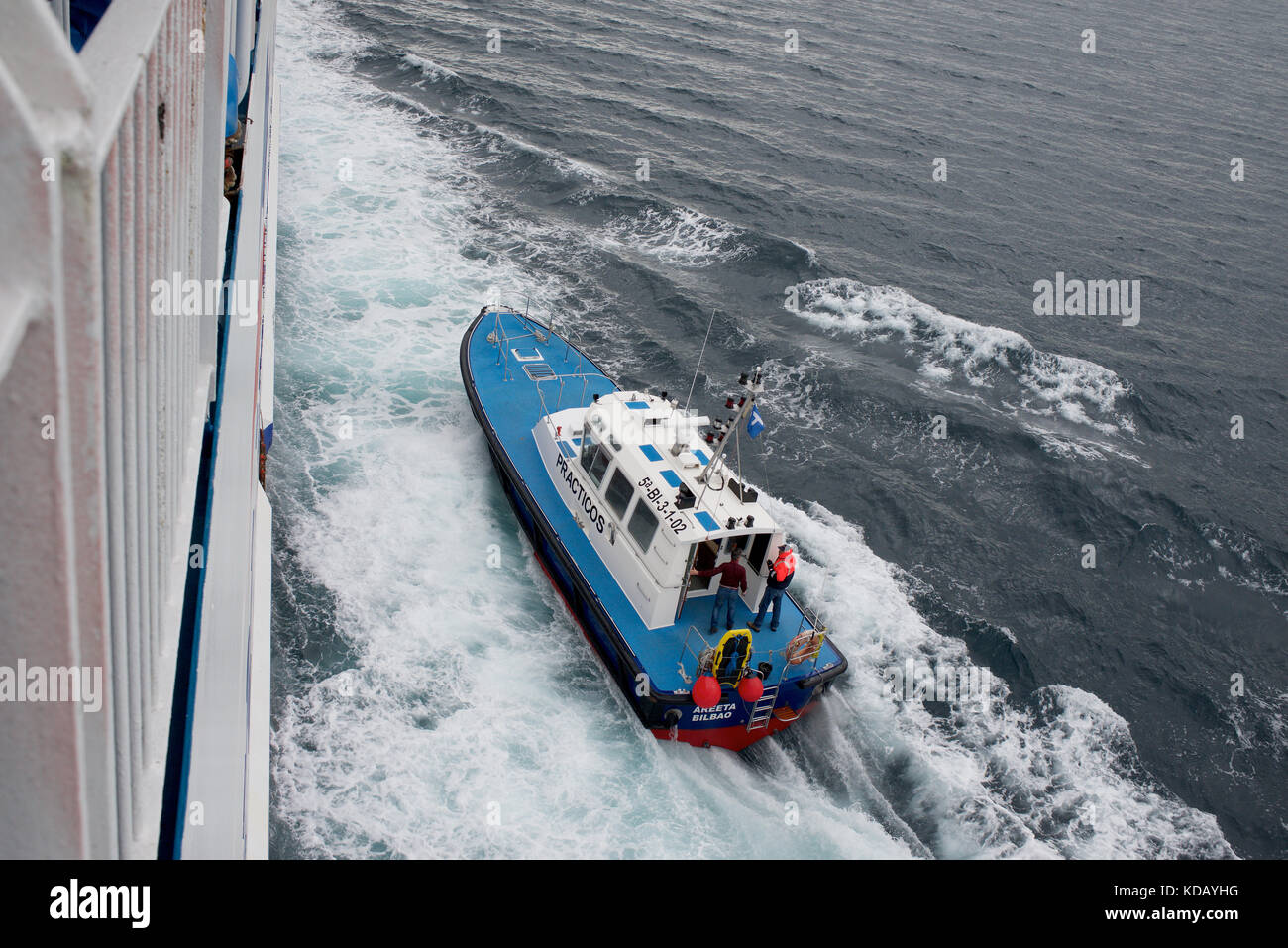 The Pilot boat comes alongside a ferry arriving at Bilbao, Spain Stock ...