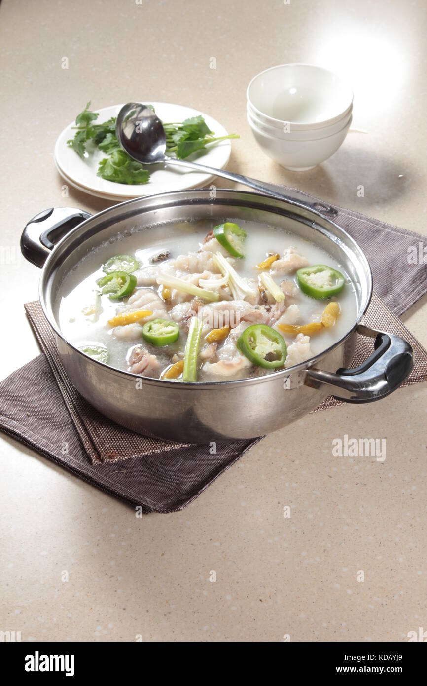 chinese chicken or seafood broth Stock Photo - Alamy