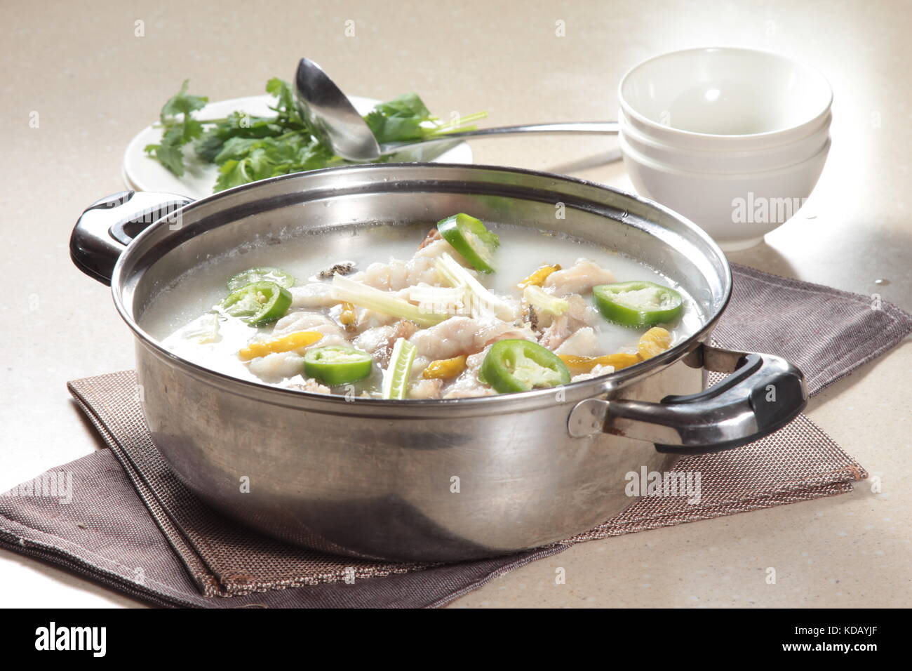 chinese chicken or seafood broth Stock Photo - Alamy