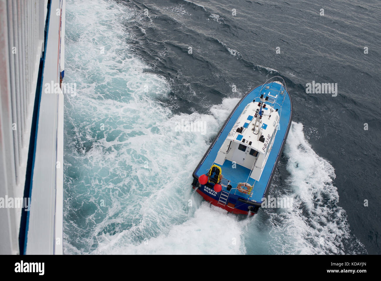The Pilot boat comes alongside a ferry arriving at Bilbao, Spain Stock ...