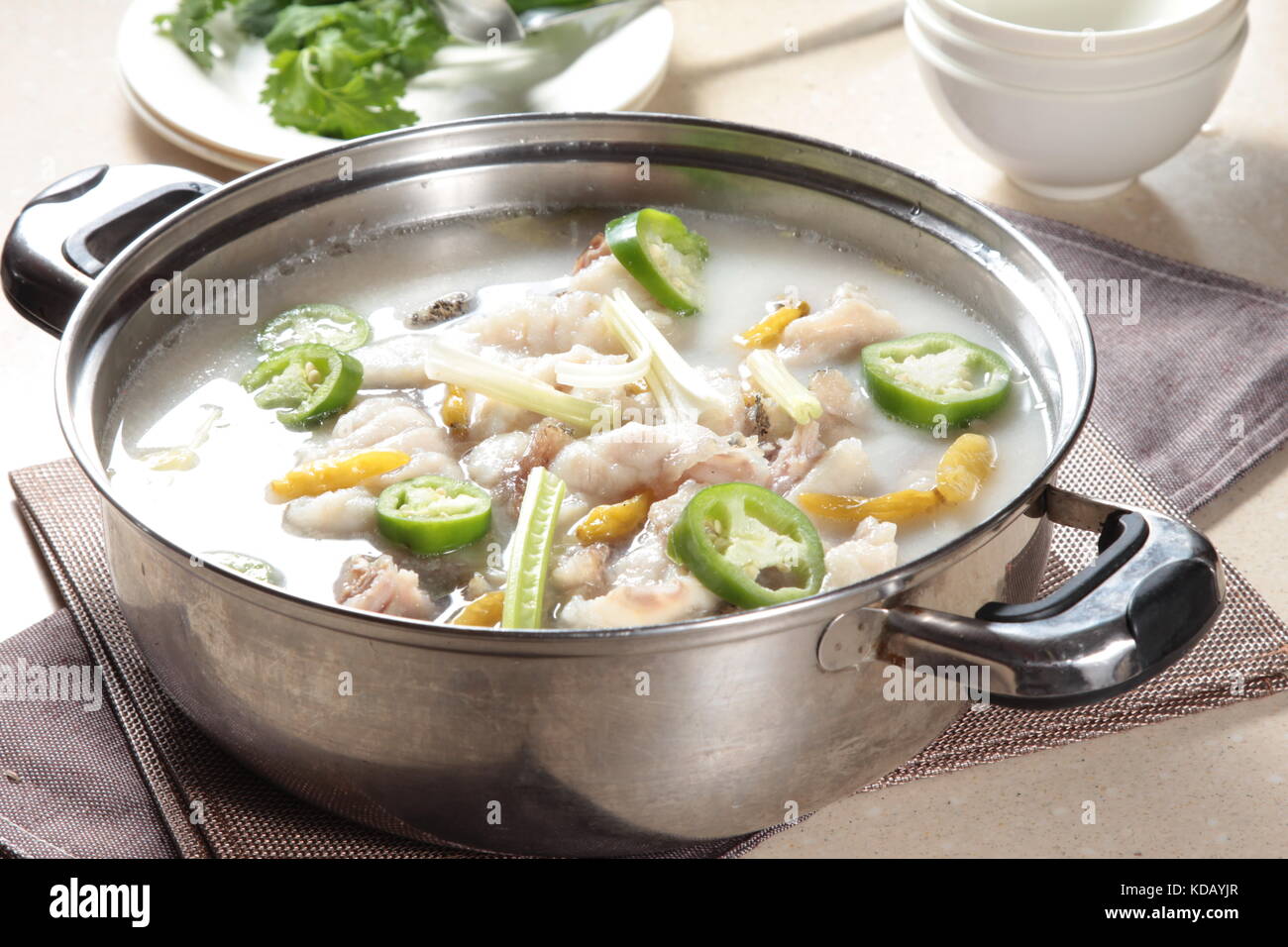 chinese chicken or seafood broth Stock Photo - Alamy