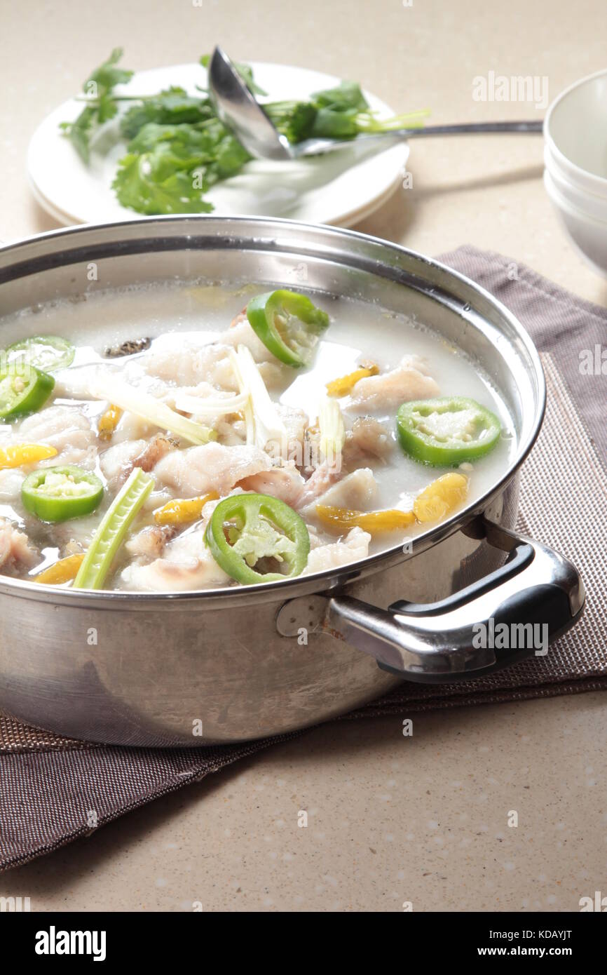 chinese chicken or seafood broth Stock Photo - Alamy