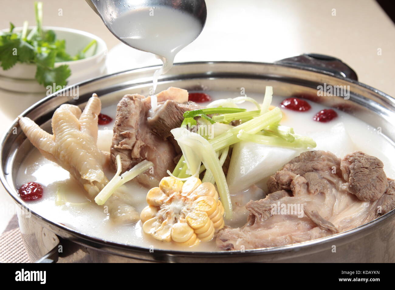 chinese chicken or seafood broth Stock Photo - Alamy