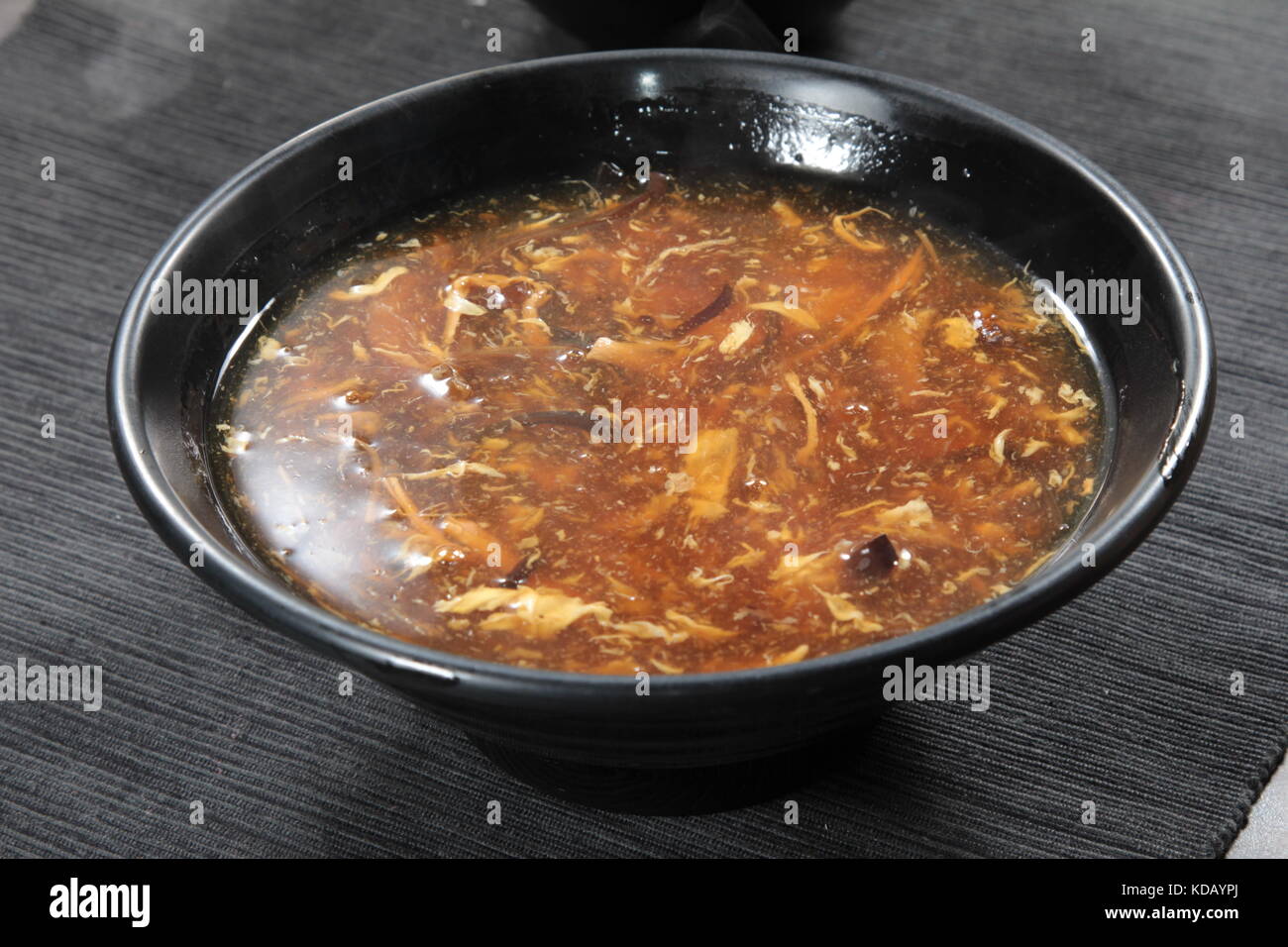 chinese chicken or seafood broth Stock Photo - Alamy
