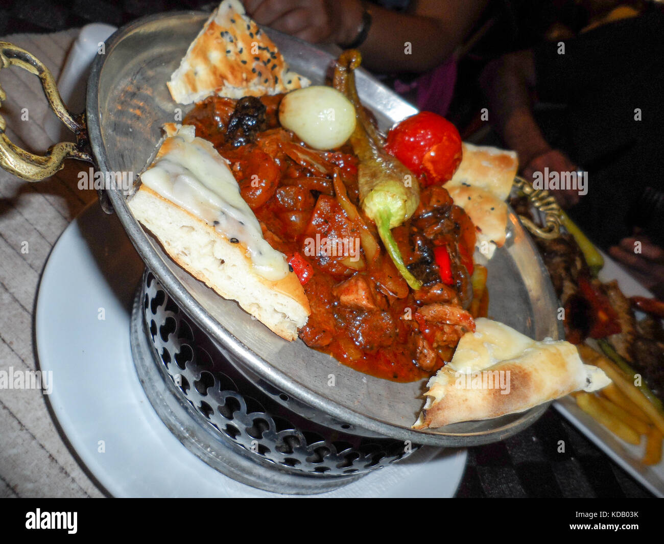 A traditional Turkish restaurant meal of Ottoman style Lamb, Osmanlu ...