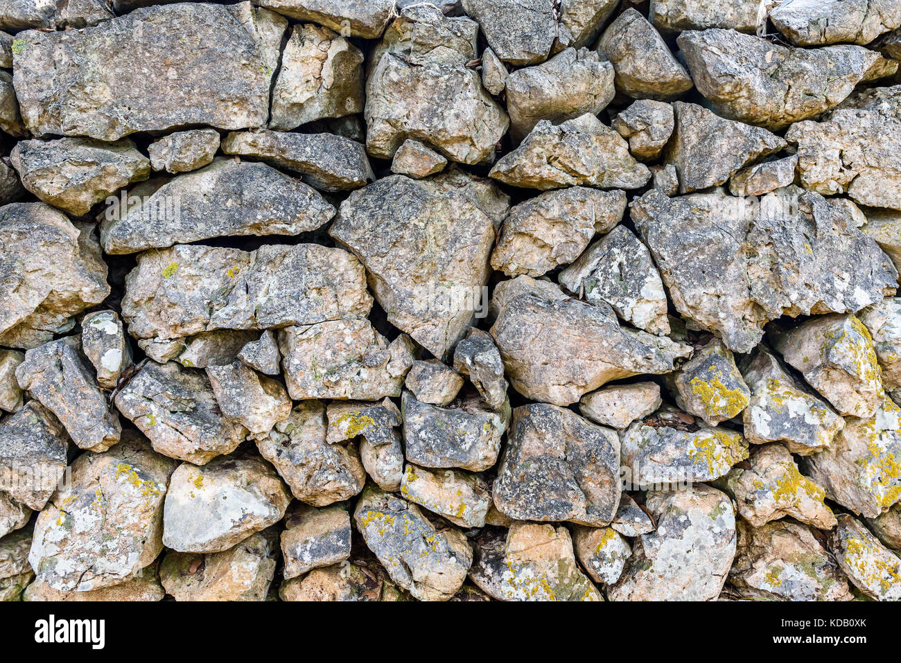 Stone rock fence or gabion wall texture. Old built natural rock wall ...