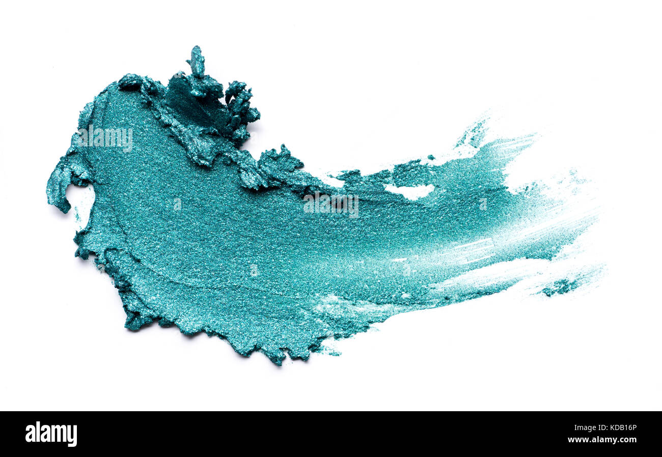 Green smear of cosmetic products on a white background Stock Photo - Alamy