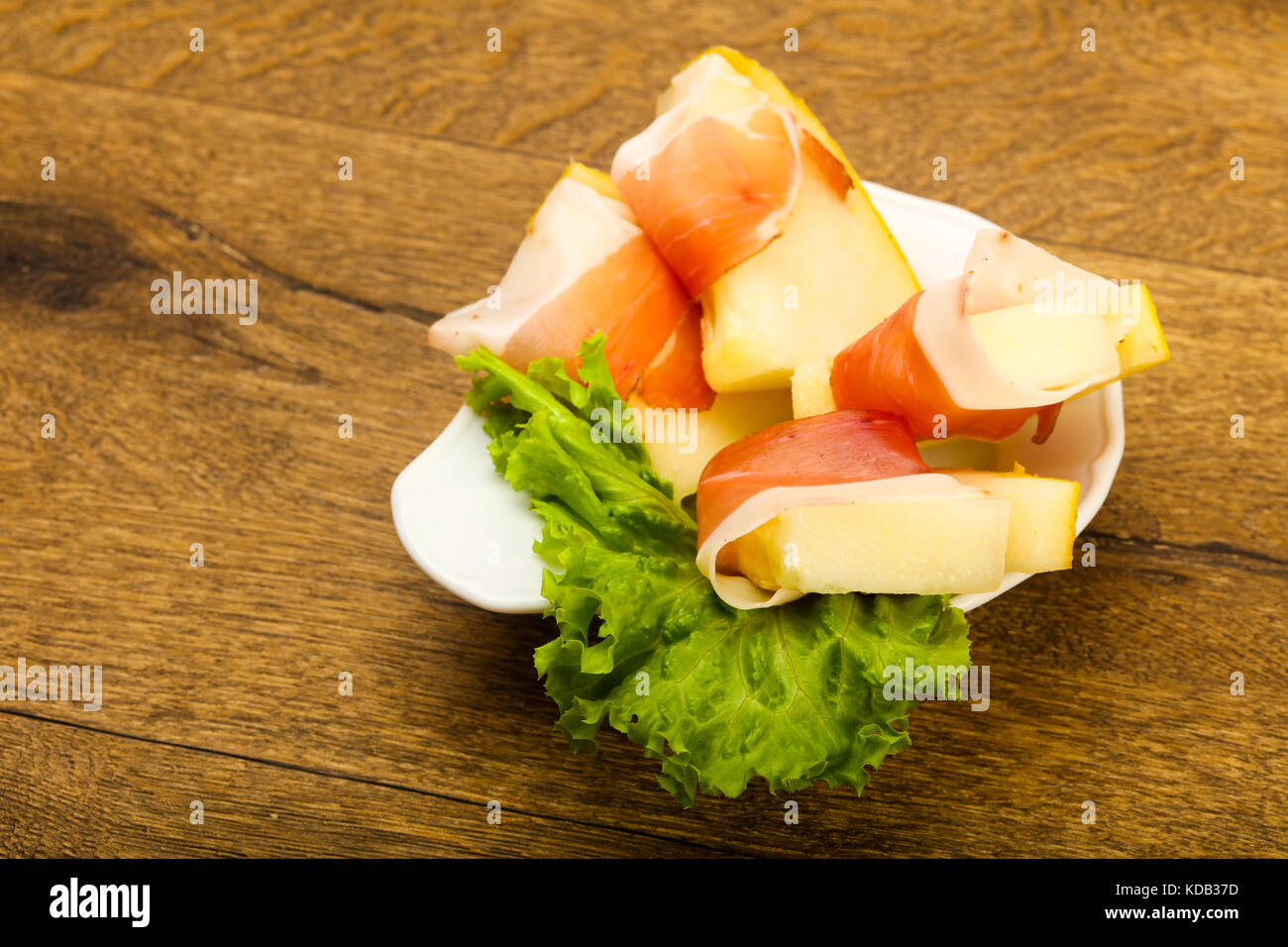 Spanish Hamon with melon Stock Photo - Alamy