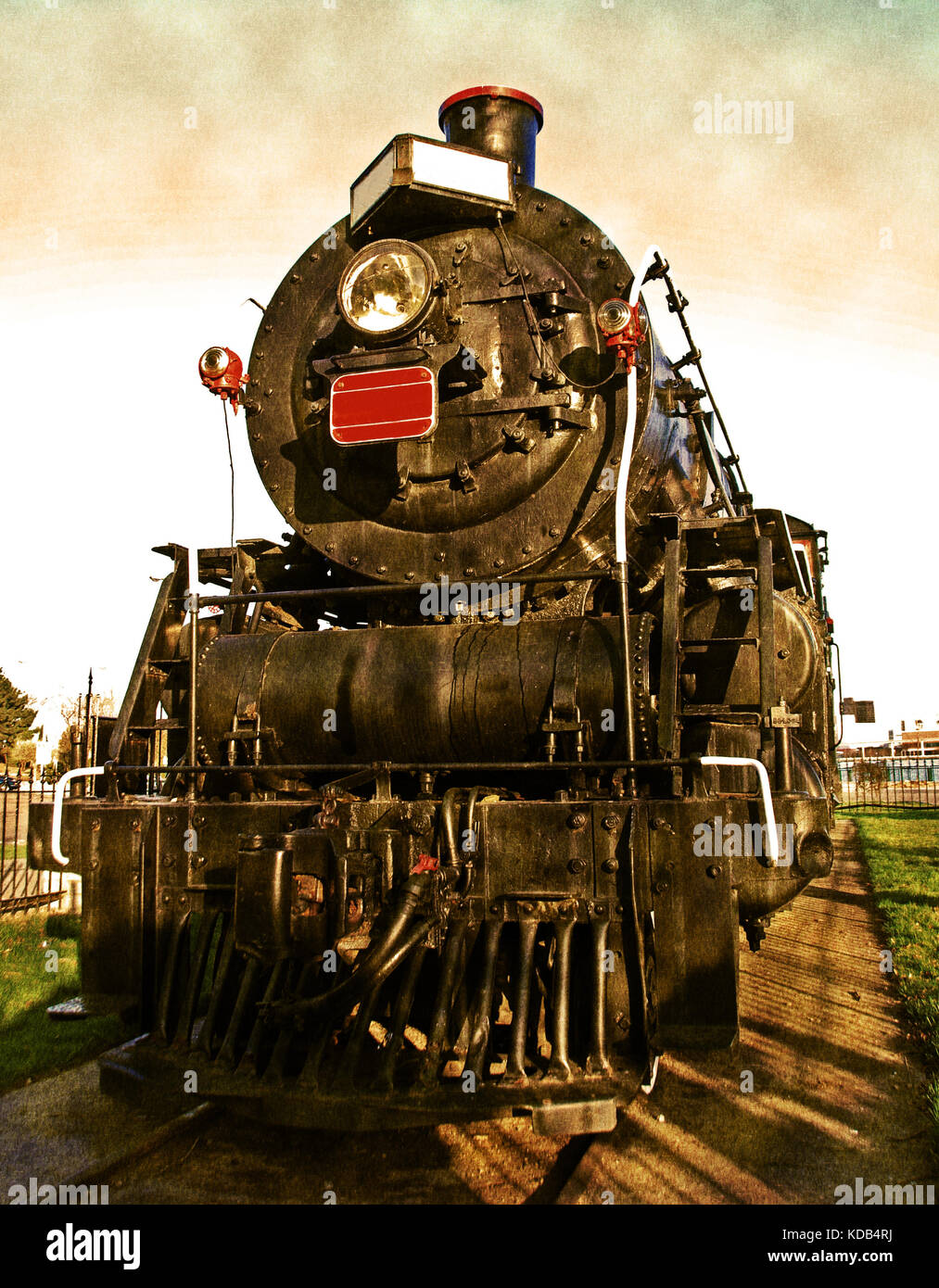 Front view of vintage steam engine resting Stock Photo - Alamy
