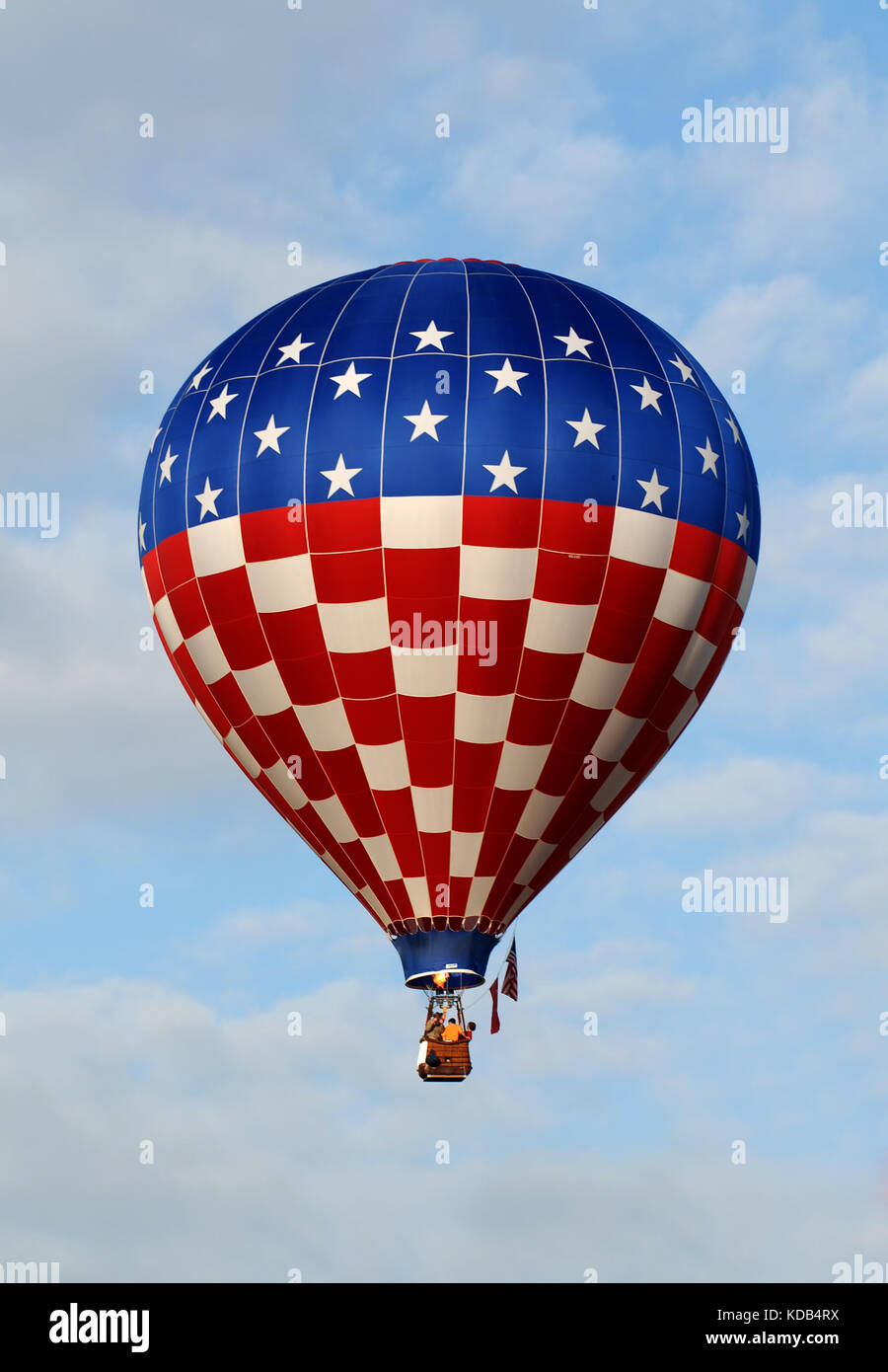 Hot air baloon in flight with the American flag colors Stock Photo - Alamy