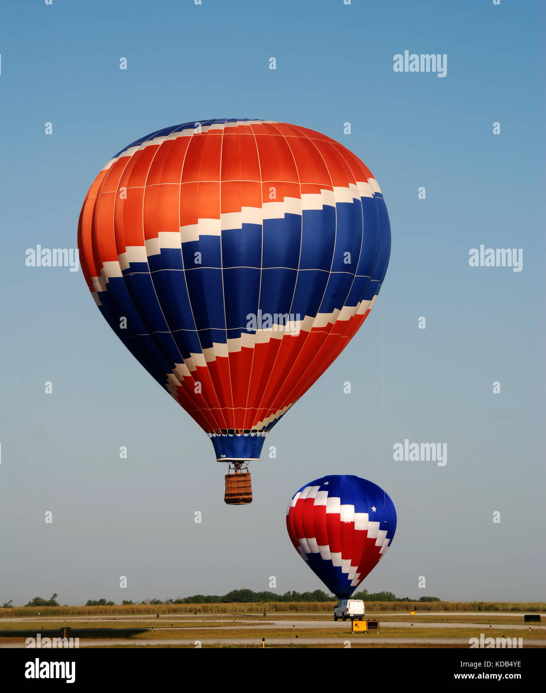 Two giant ballons landing Stock Photo - Alamy