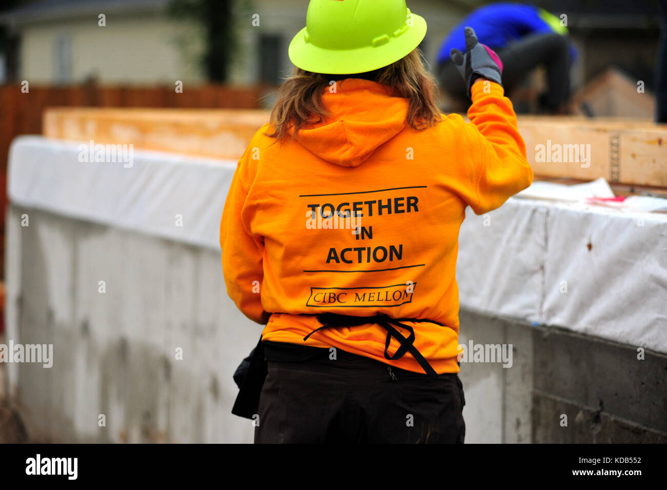 A community group building a house for Habitat for Humanity in Canada ...