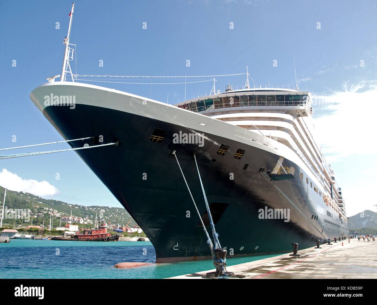 Modern cruise ship docked in port Stock Photo - Alamy