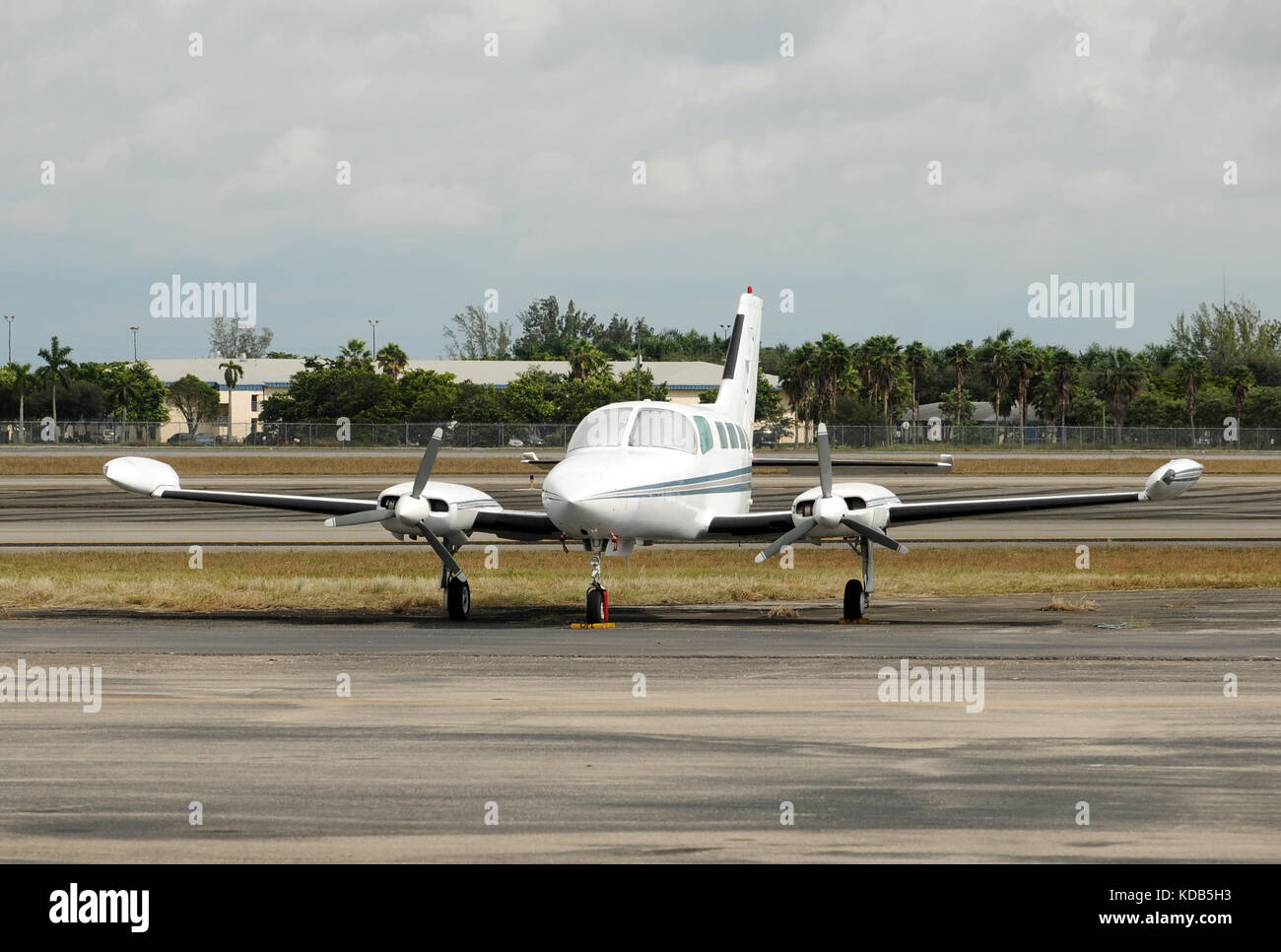 Twin engine turboprop airplane parked on a tarmac Stock Photo - Alamy