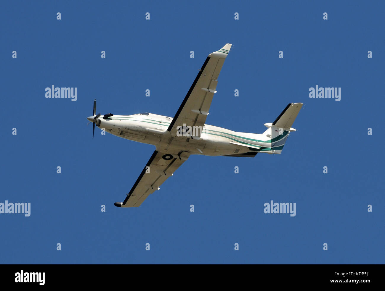 Propeller driven airplane passing overhead Stock Photo - Alamy