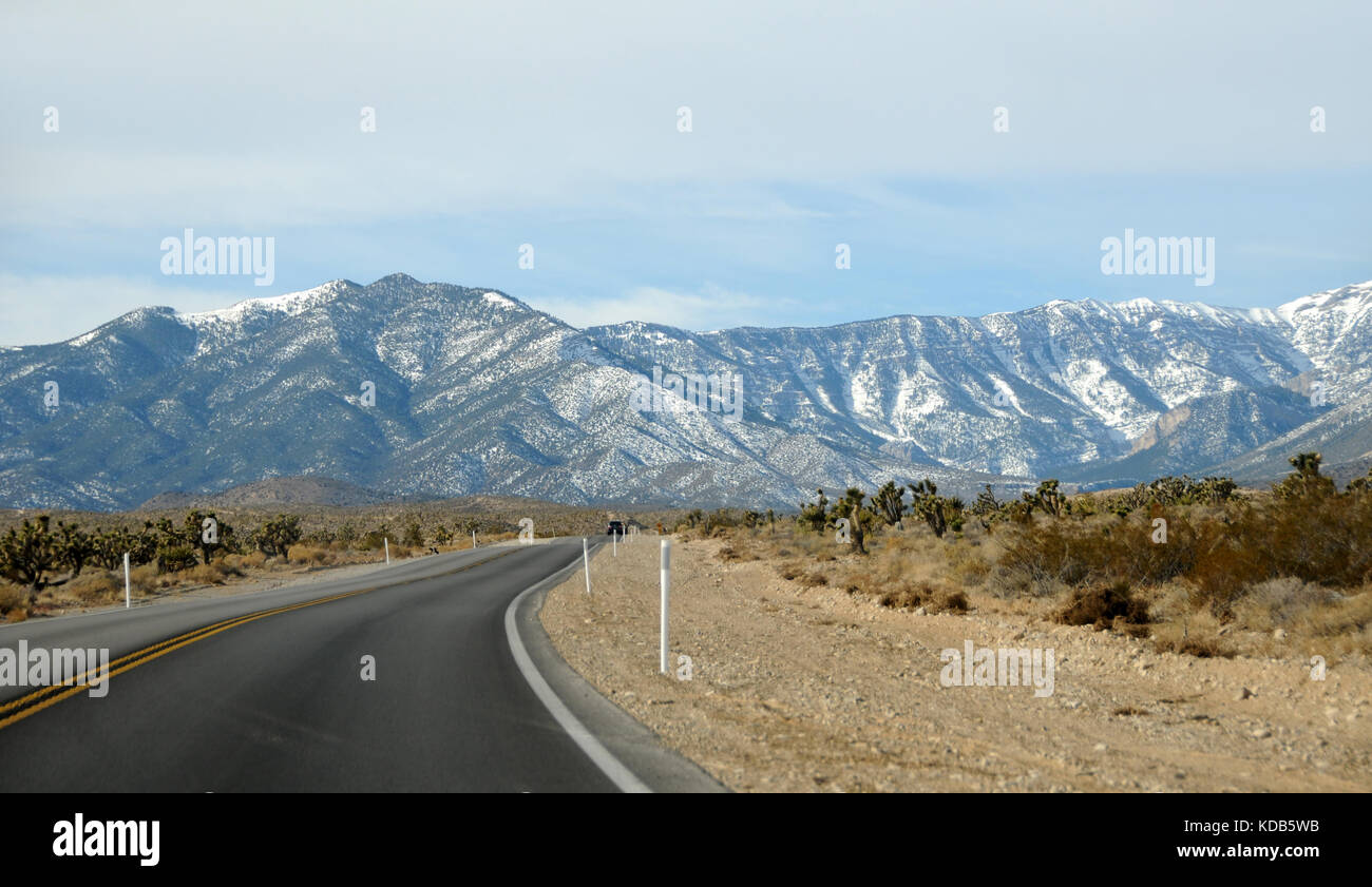Scenic winding road leading up to a mountain Stock Photo - Alamy