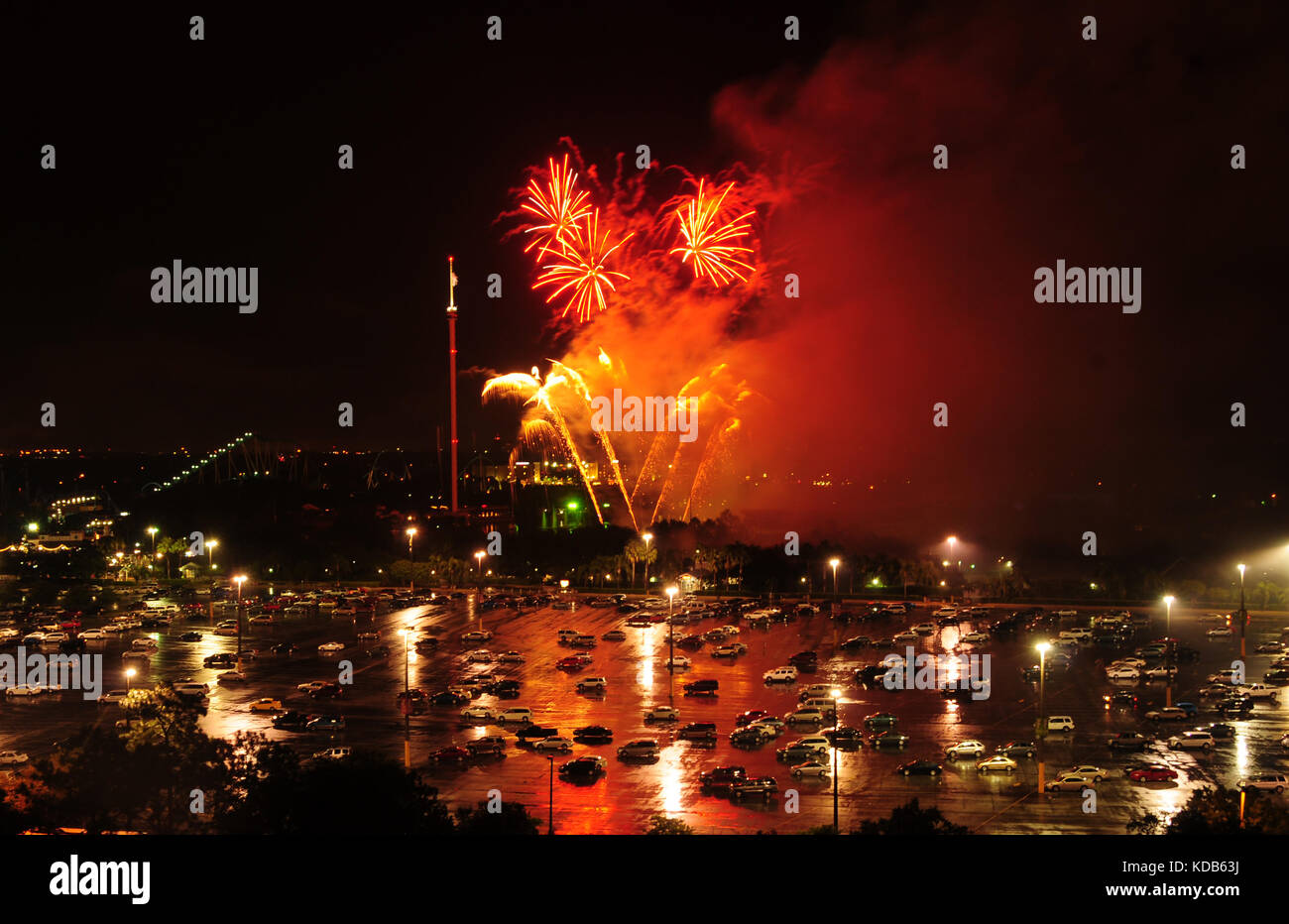 Aerial view of parking lot and bright red fireworks Stock Photo - Alamy