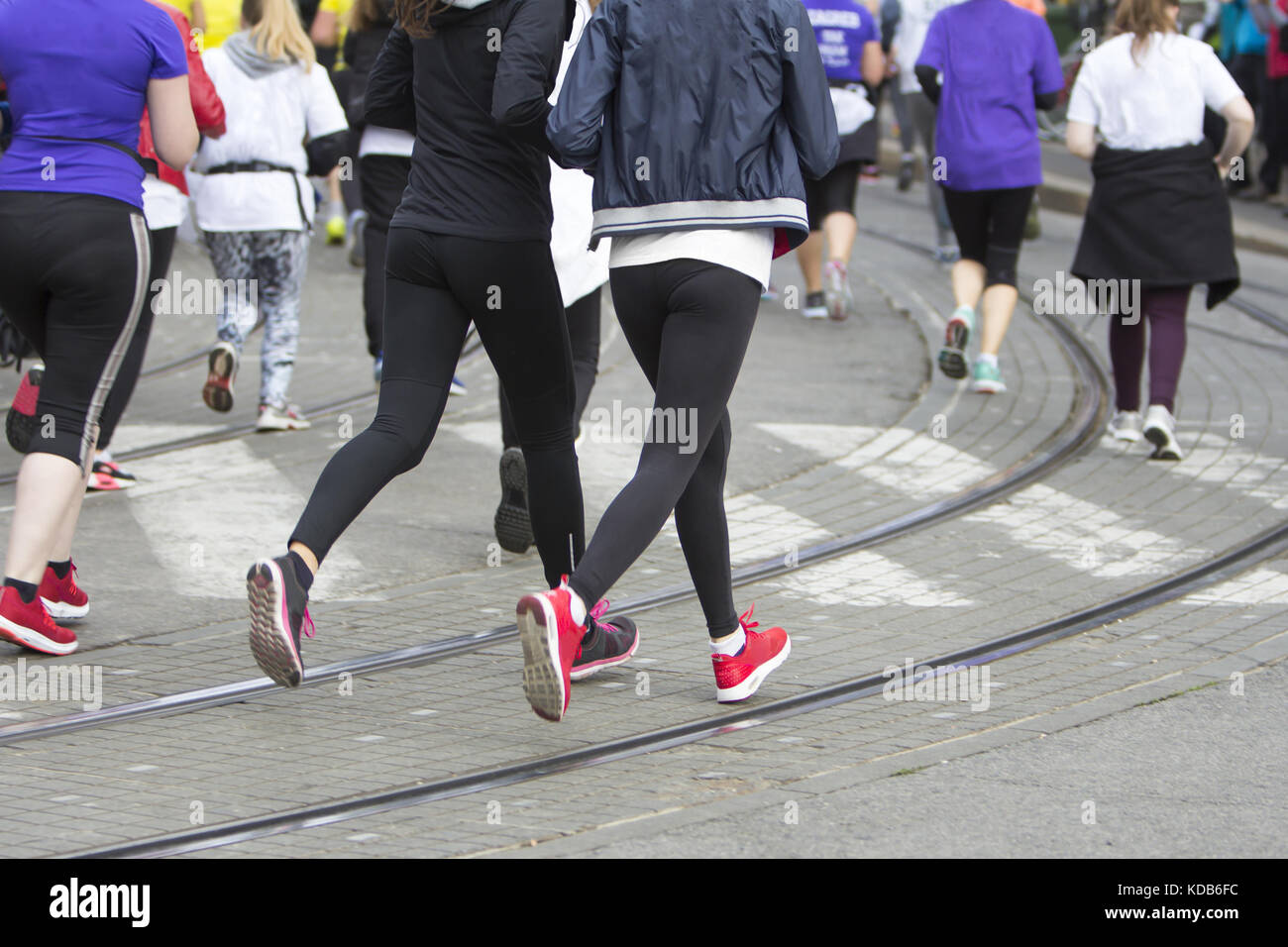 Marathon running race on the city road Stock Photo - Alamy