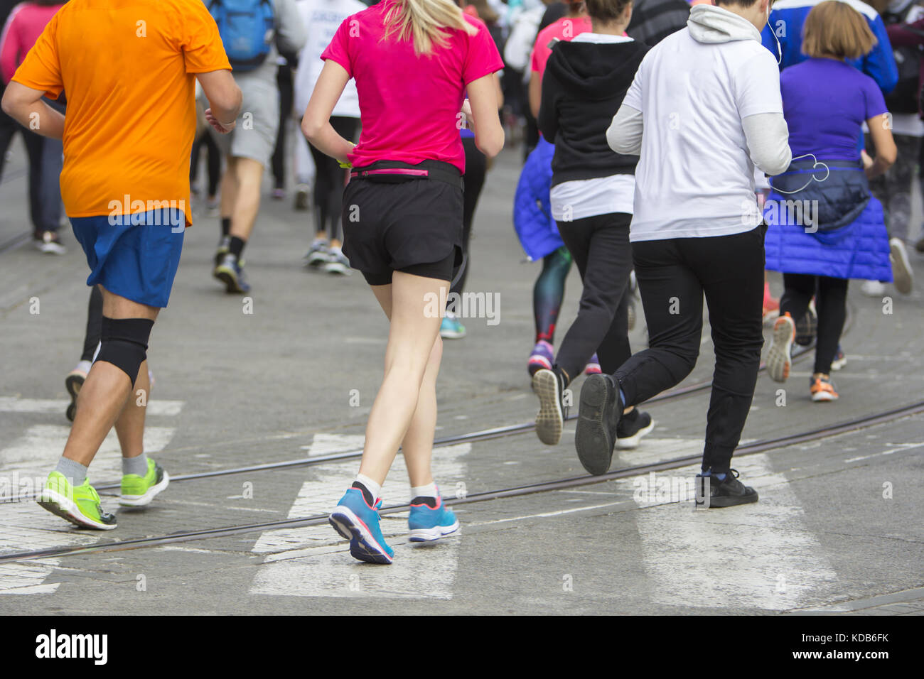 Marathon running race on the city road Stock Photo - Alamy