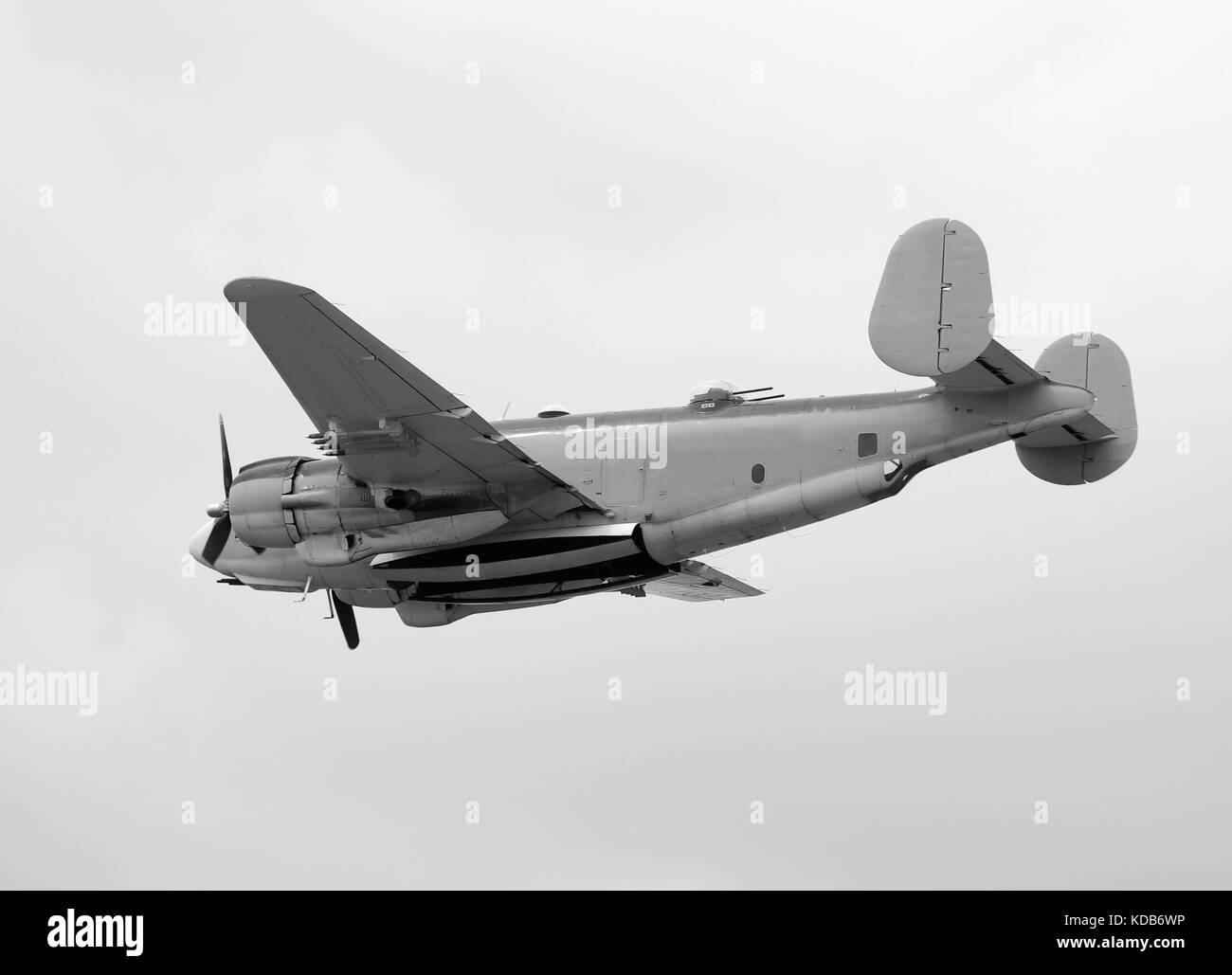 World War II era Navy bomber in flight Stock Photo - Alamy