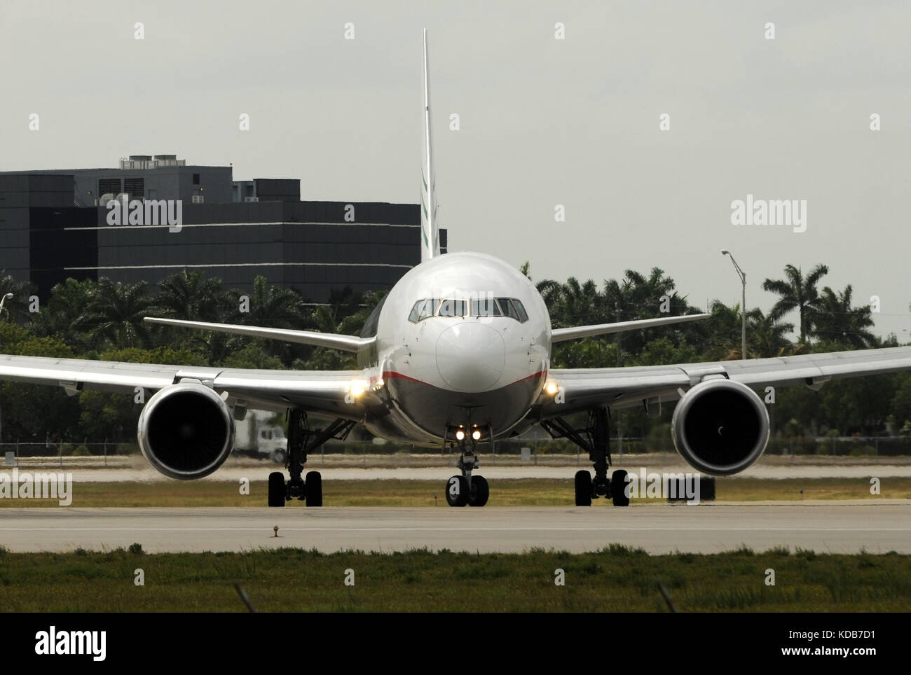 Passenger jet airplane front viee before takeoff Stock Photo - Alamy