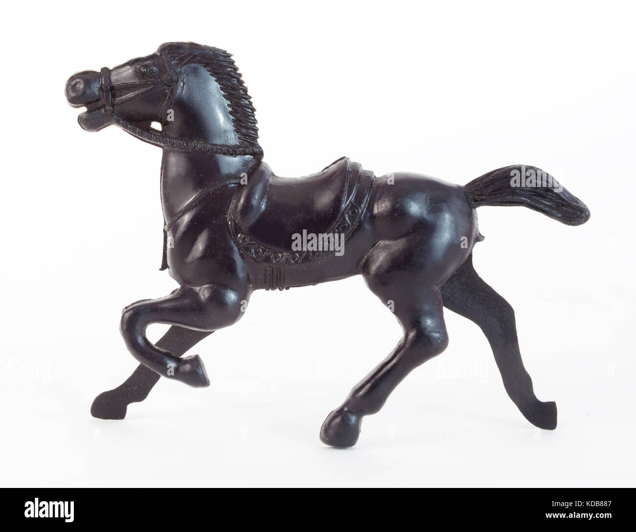 Isolated black toy horse Stock Photo - Alamy