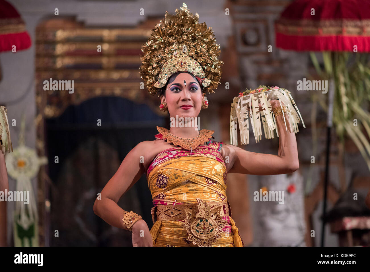 Traditional Balinese Legong dancer performing in a theater in Ubud ...