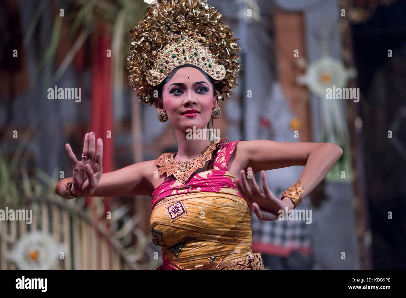 Traditional Balinese Legong dancer performing in a theater in Ubud ...