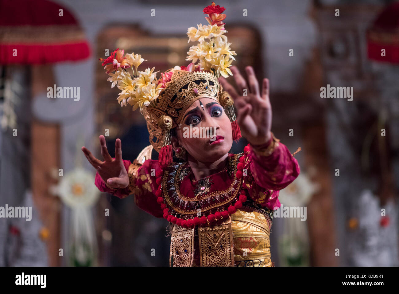 Traditional Balinese Legong dancer performing in a theater in Ubud ...