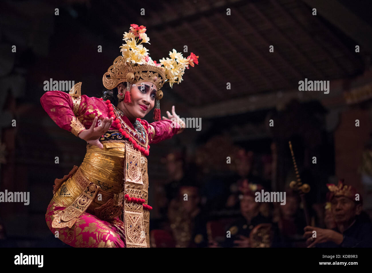 Traditional Balinese Legong dancer performing in a theater in Ubud ...
