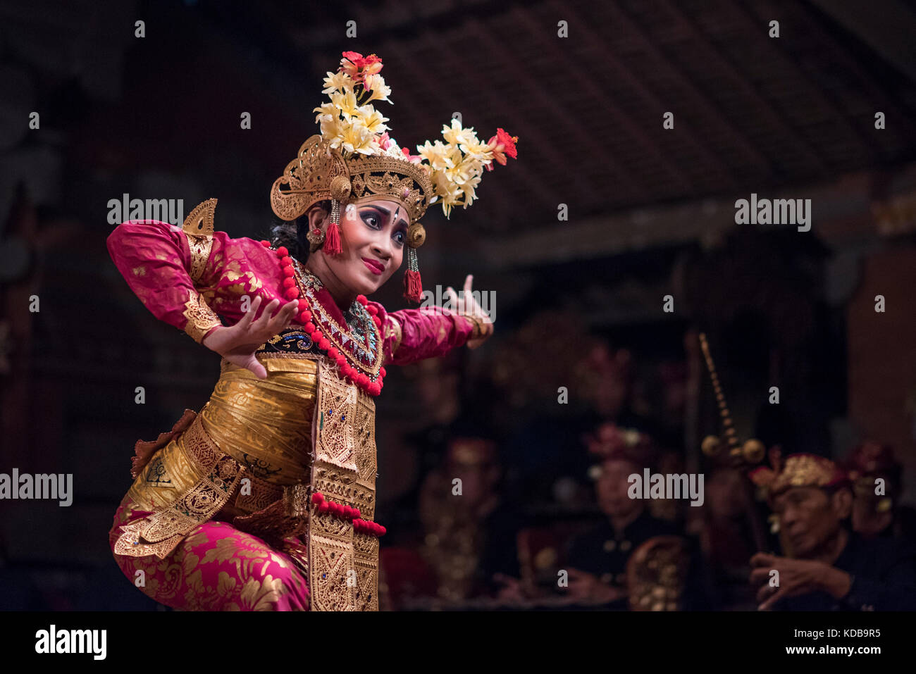Traditional Balinese Legong dancer performing in a theater in Ubud ...