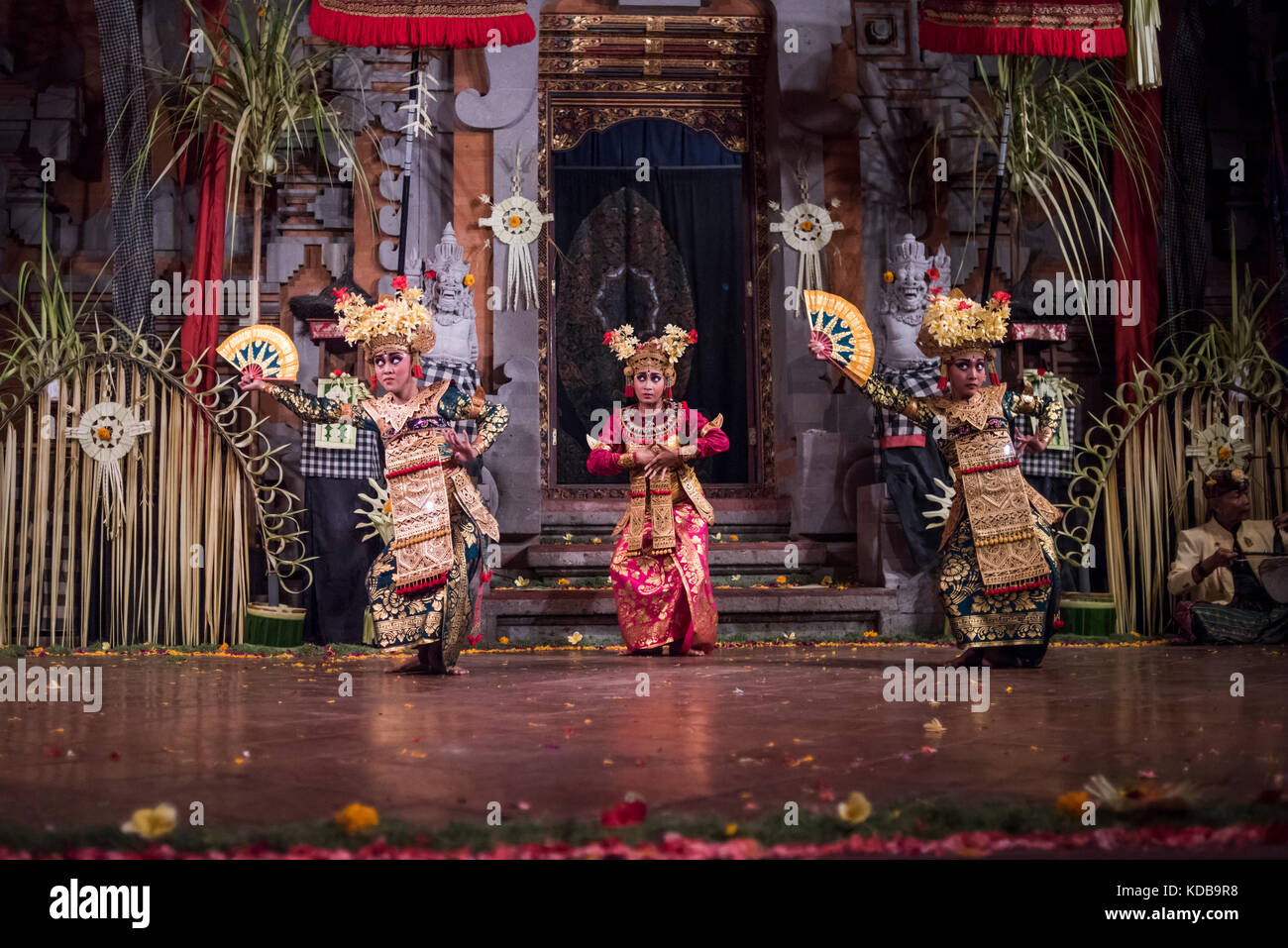 Traditional Balinese Legong dancers performing in a theater in Ubud ...