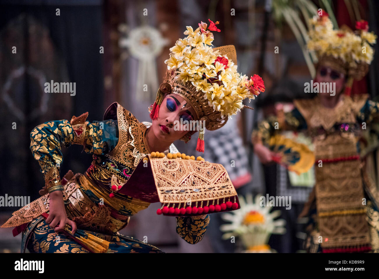 Traditional Balinese Legong dancers performing in a theater in Ubud ...