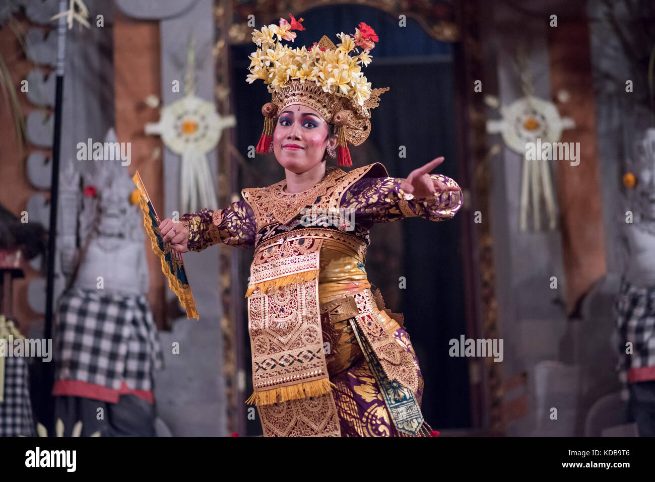 Traditional Balinese Legong dancer performing in a theater in Ubud ...