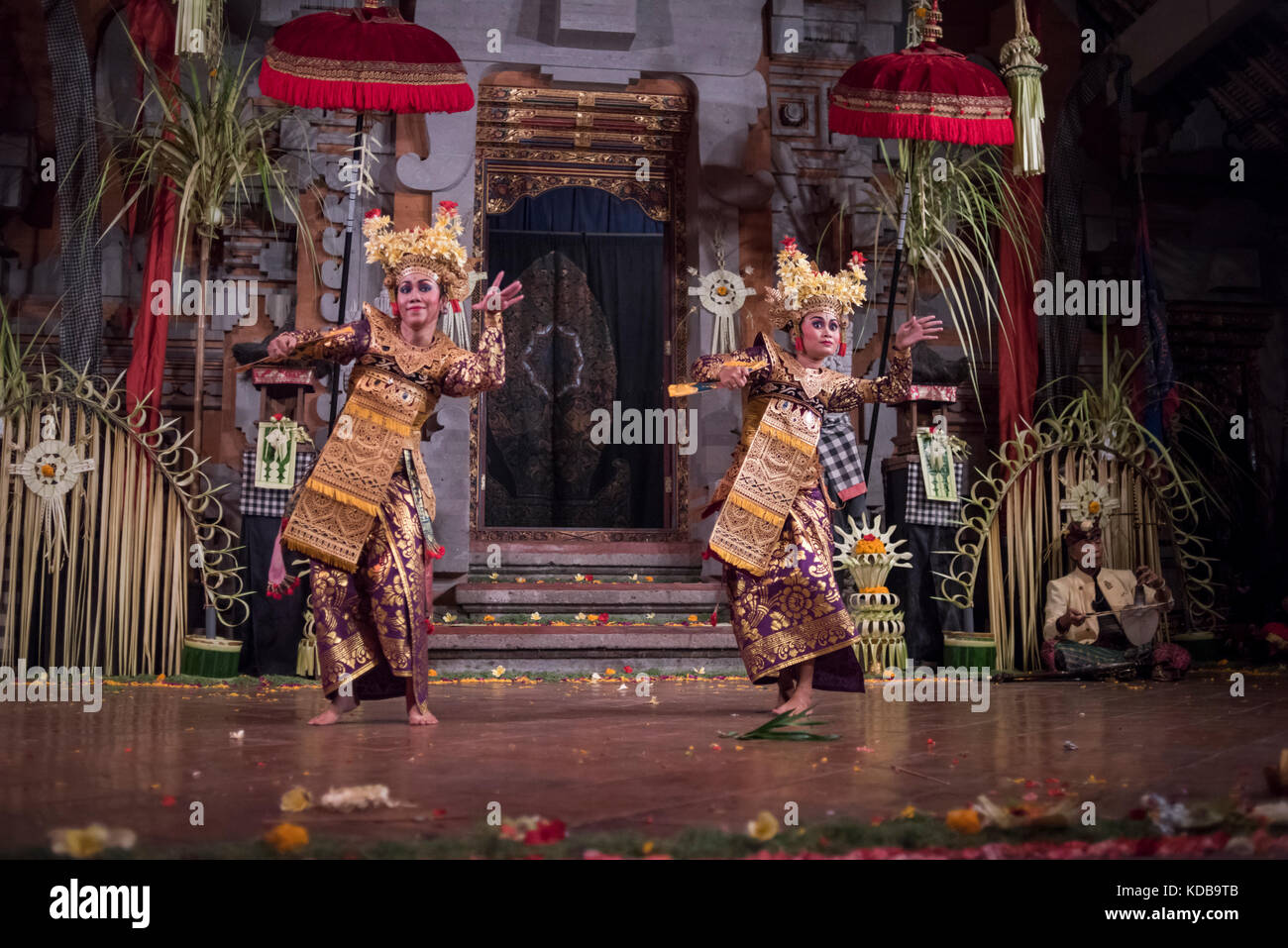 Traditional Balinese Legong dancers performing in a theater in Ubud ...