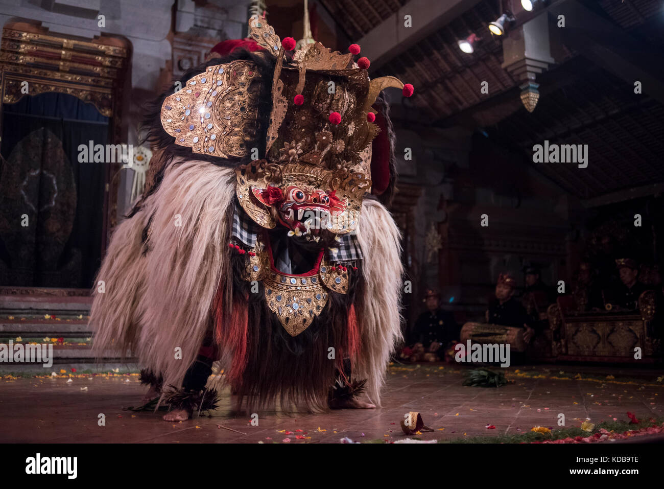 Traditional Balinese Legong dancer performing in a theater in Ubud ...