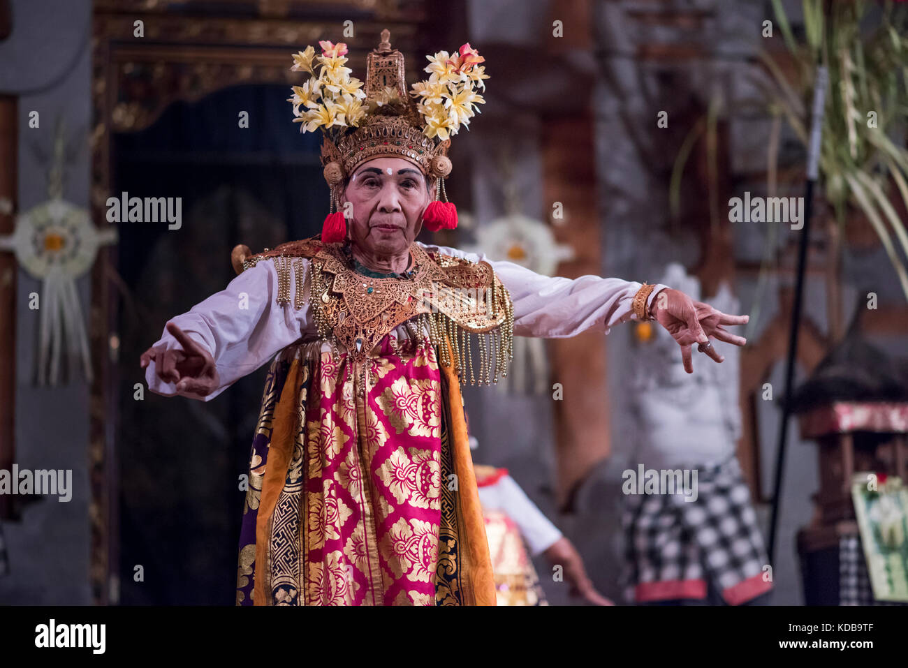 Traditional Balinese Legong dancer performing in a theater in Ubud ...
