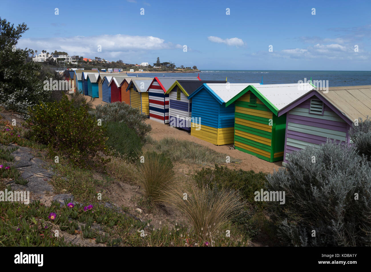 Bathing boxes with coastal view Stock Photo - Alamy