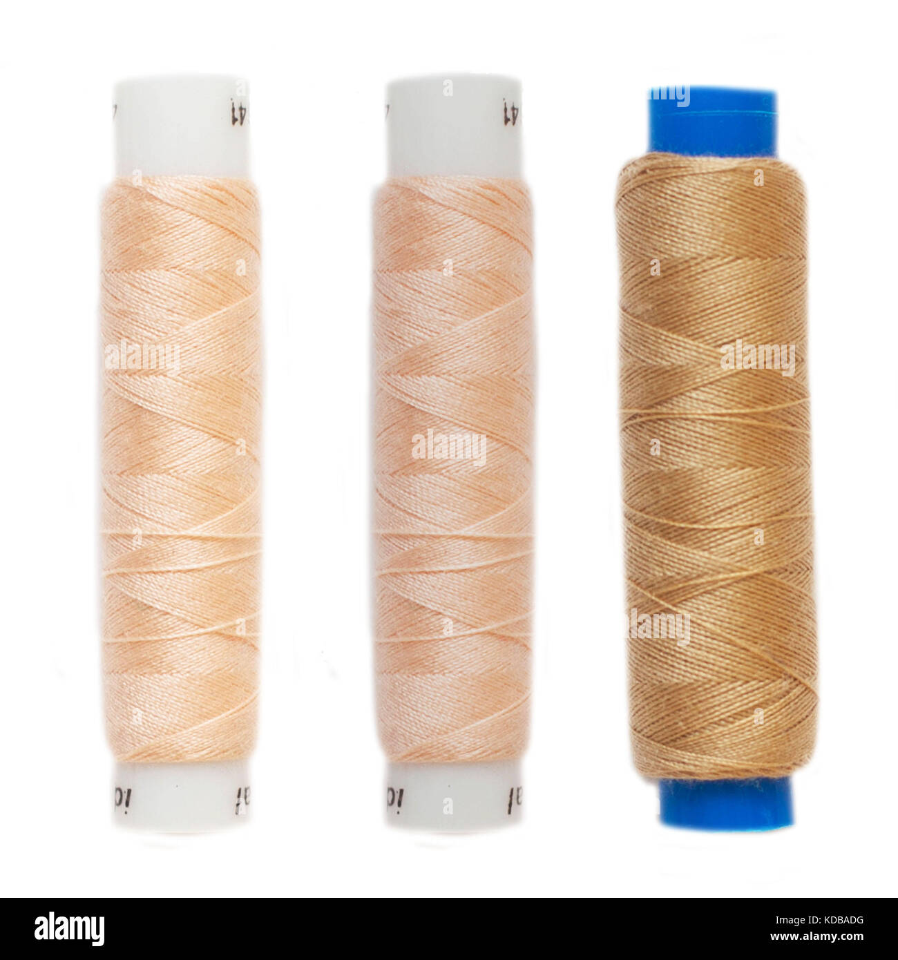 Beige thread. Isolated. White background Stock Photo - Alamy