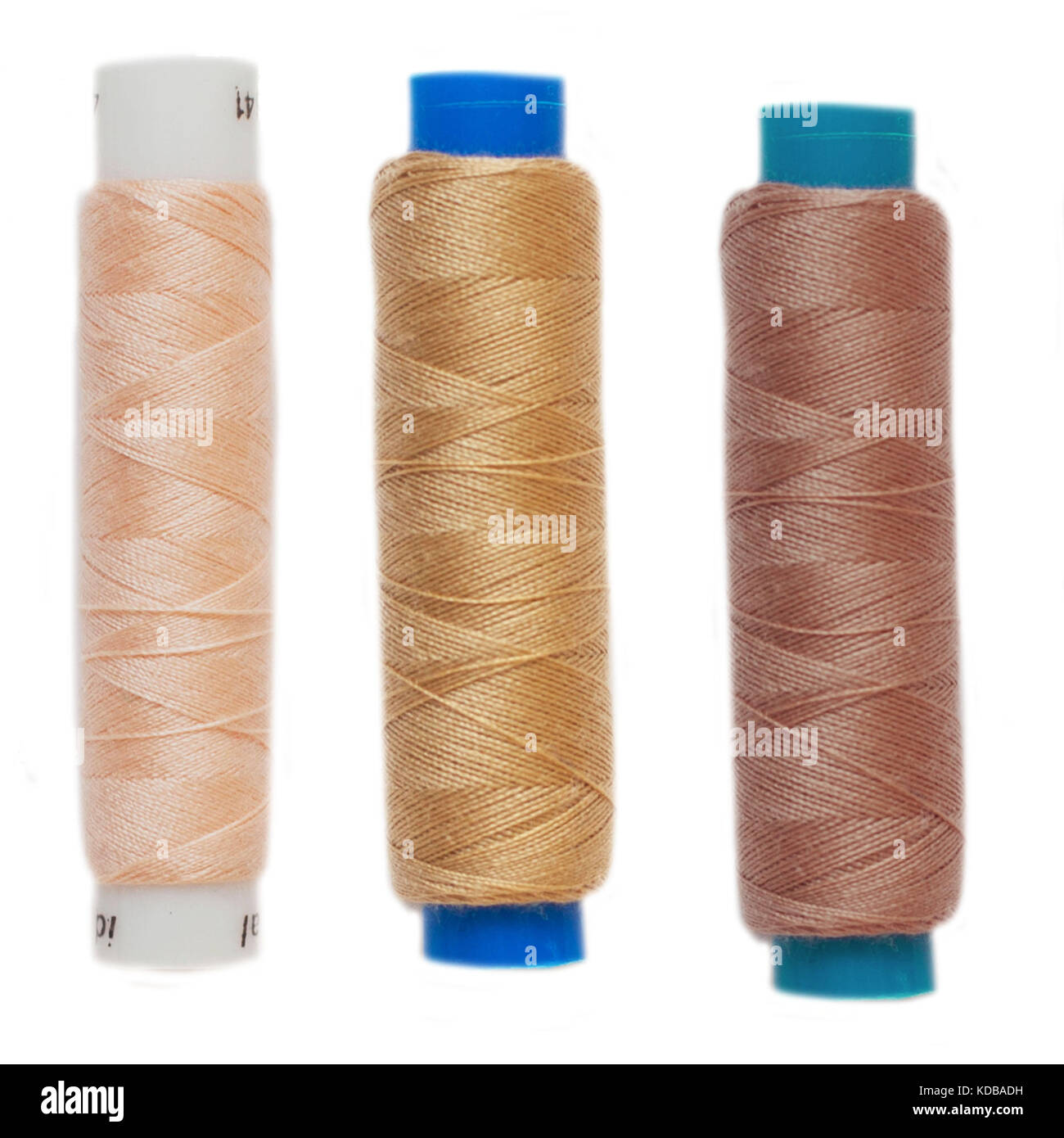 Beige thread. Isolated. White background Stock Photo - Alamy