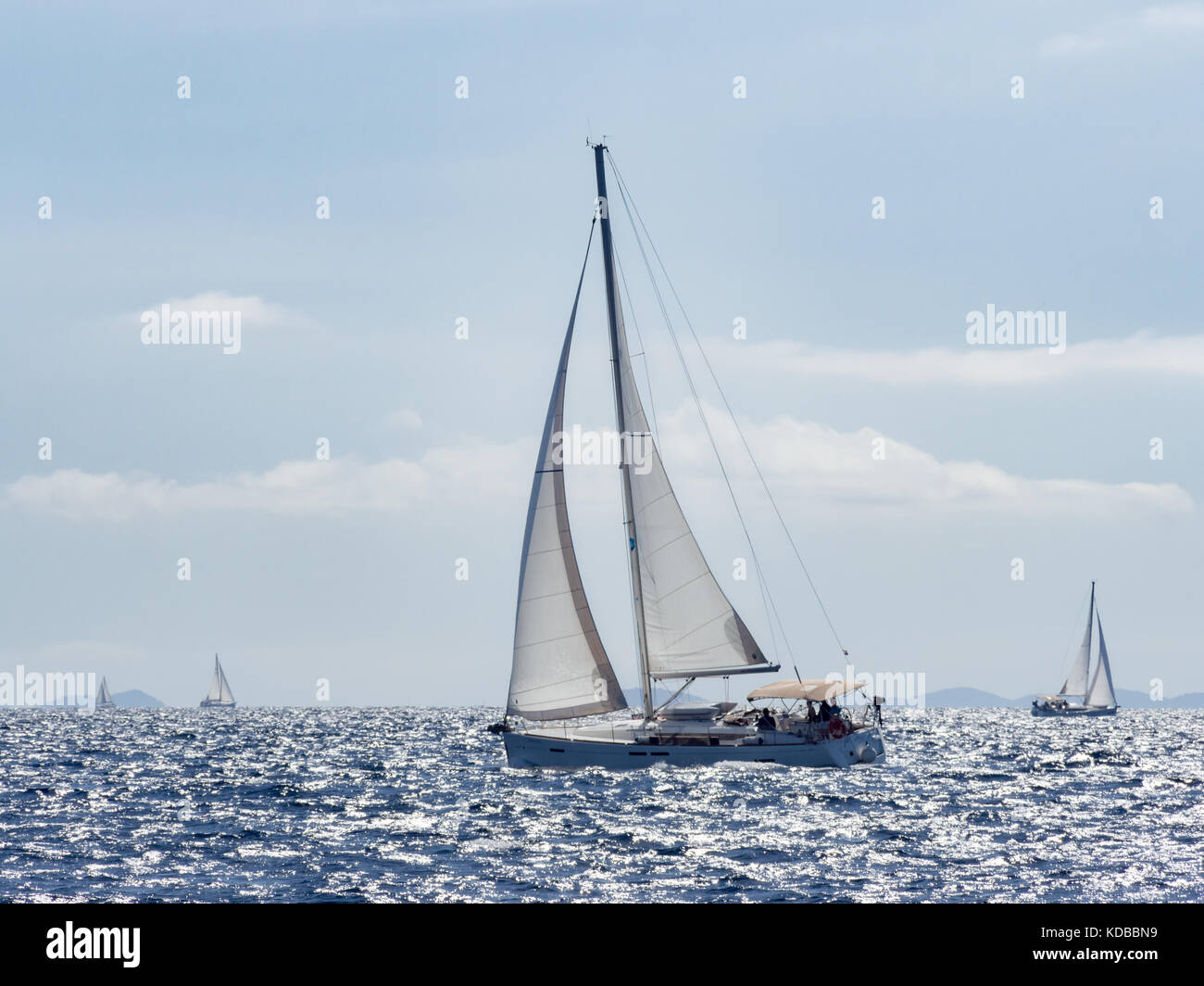 Sailing yacht in Croatia, windy summer on the boat between rocky ...