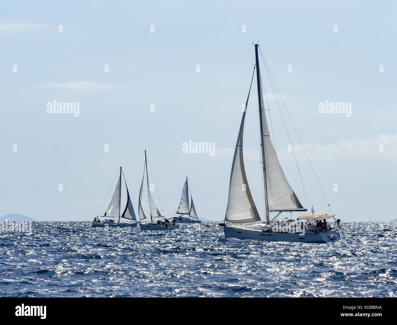 Sailing yacht in Croatia, windy summer on the boat between rocky ...