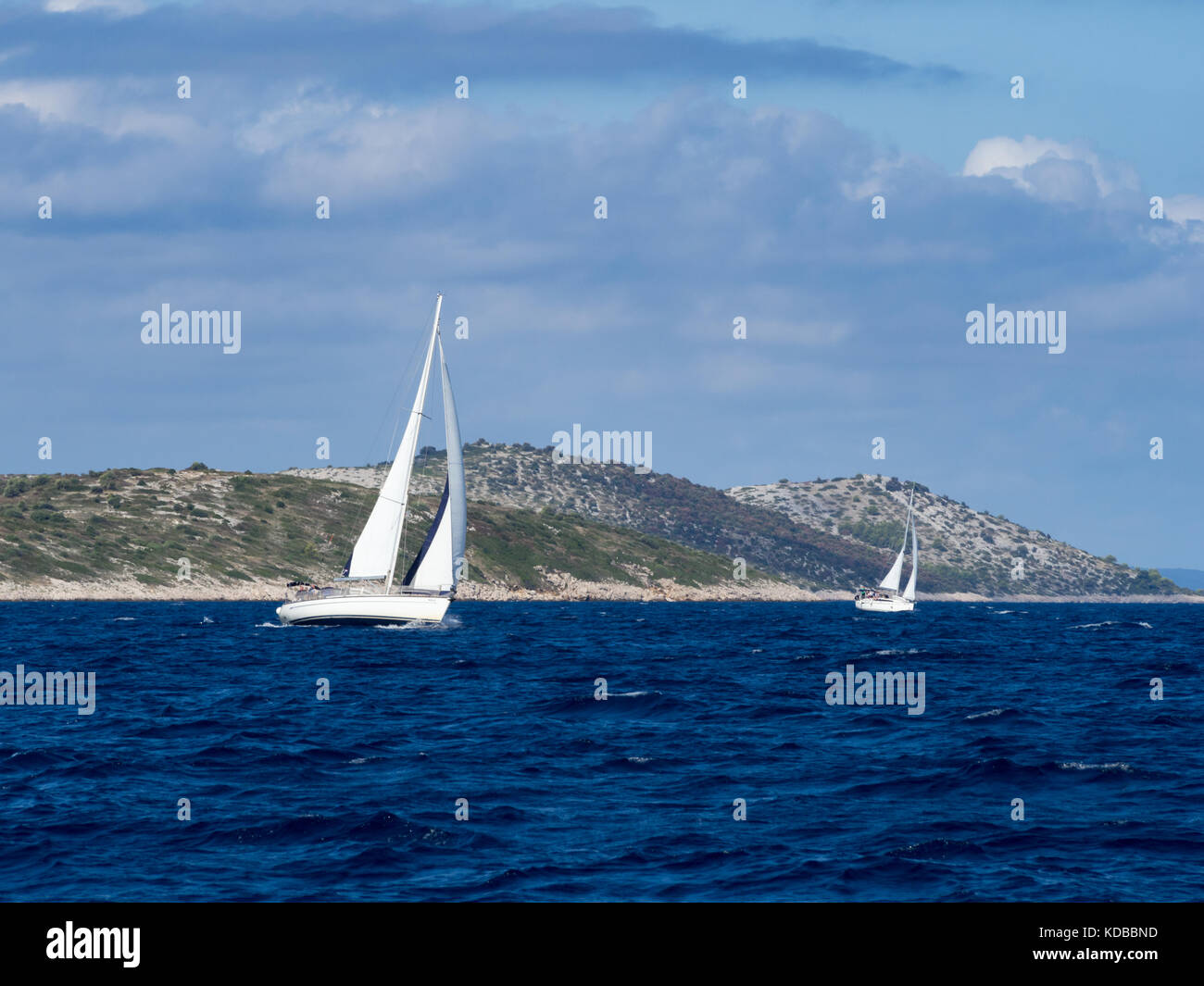 Sailing yacht in Croatia, windy summer on the boat between rocky ...