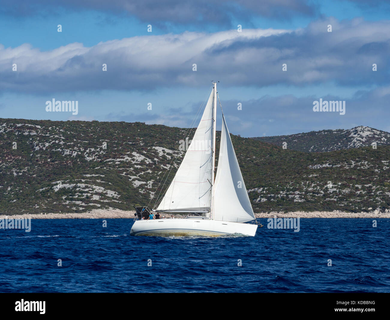 Sailing yacht in Croatia, windy summer on the boat between rocky ...
