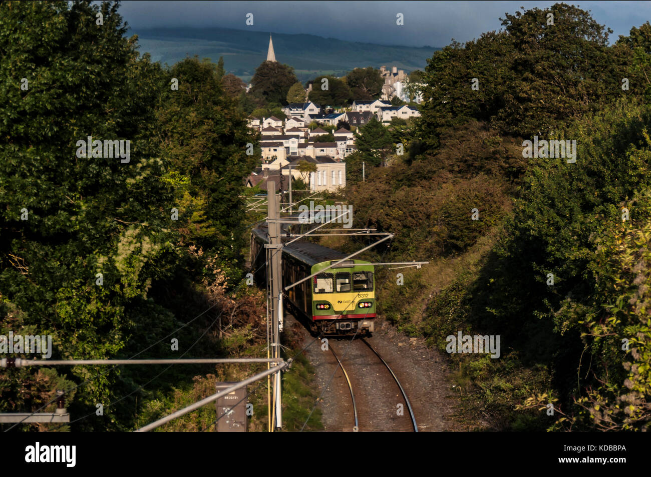 DART train with Bray Town and Wicklow Mountains on the background ...