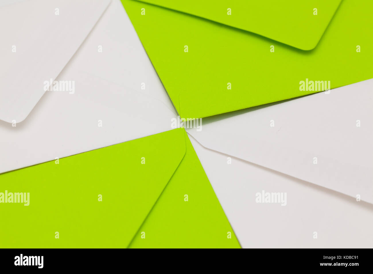 Different colored envelopes on the table Stock Photo - Alamy