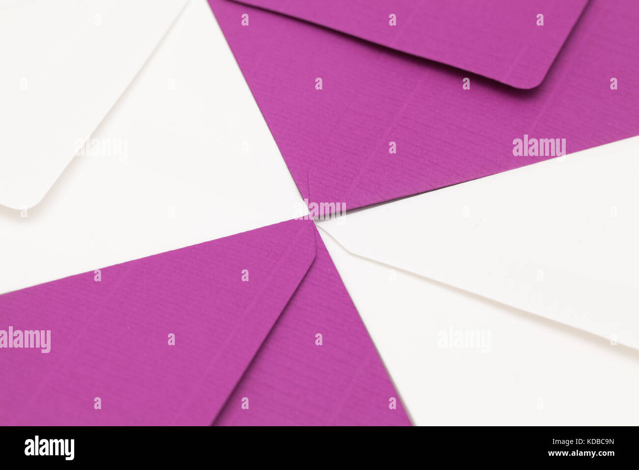 Different colored envelopes on the table Stock Photo - Alamy