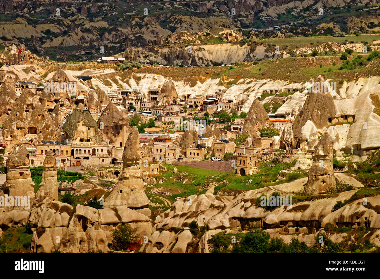 Fairy chimney formations rising up around Goreme town centre ...